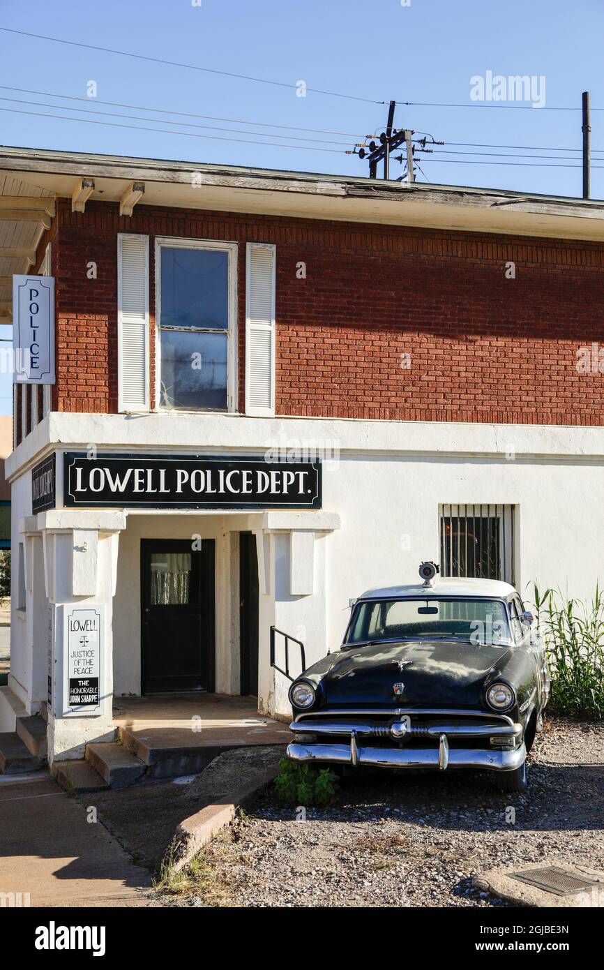 Lowell, Arizona. Vintage police car parked in front of police station ...