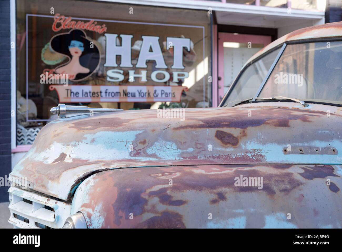 Lowell, Arizona. Hood of a rusty old car parked in front of a vintage ...