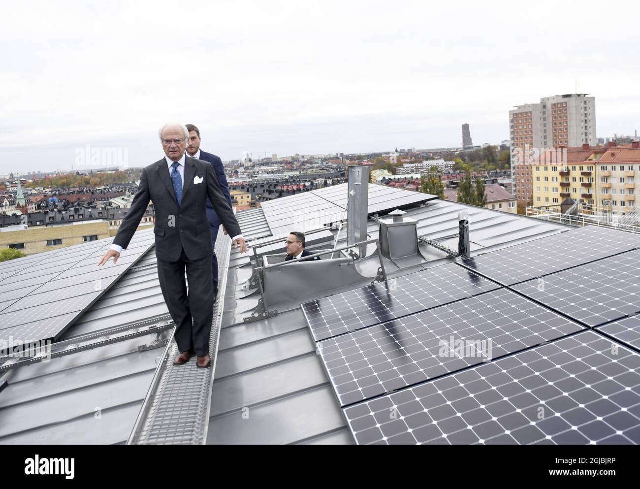 STOCKHOLM 2018-10-10 King Carl Gustaf inspect solar panels on a roof ...