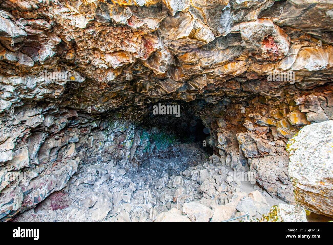 USA, California. Lava Beds National Monument, Merrill Cave entrance ...