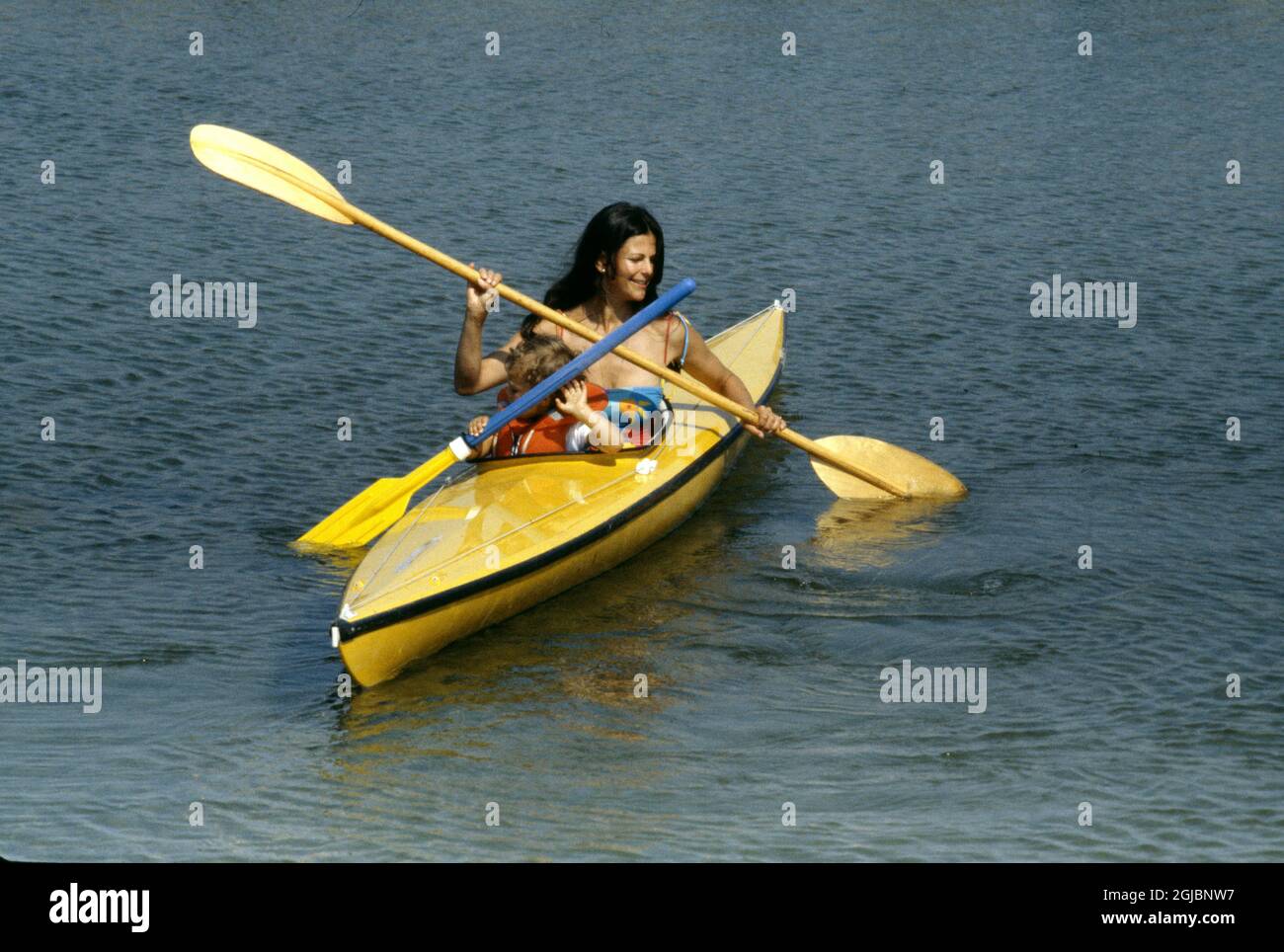 Queen Silvia and Crown Princess Victoria in a canoe at Oland 1980 (c ...