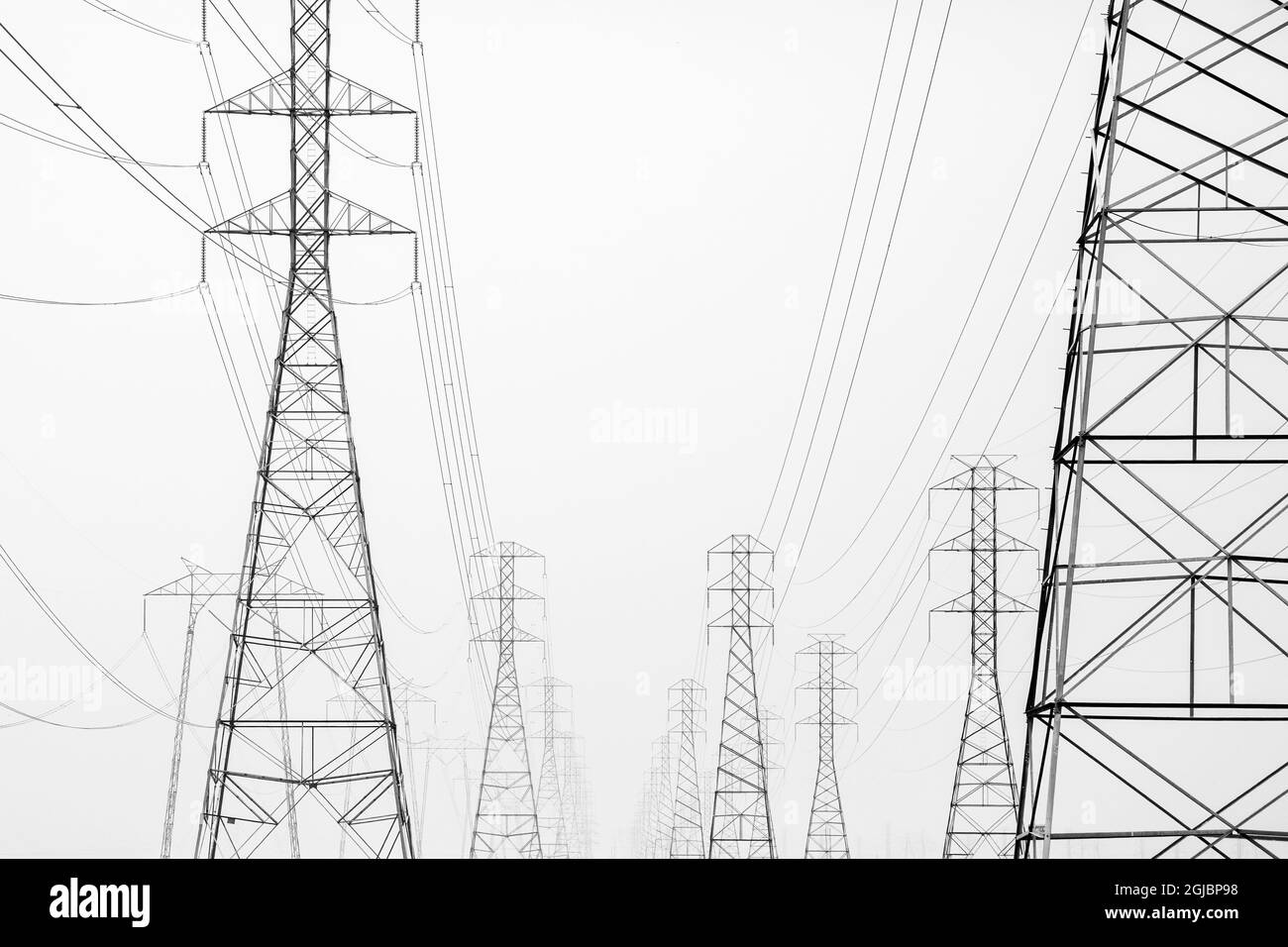 USA, California. Converging transmission towers and power lines Stock ...