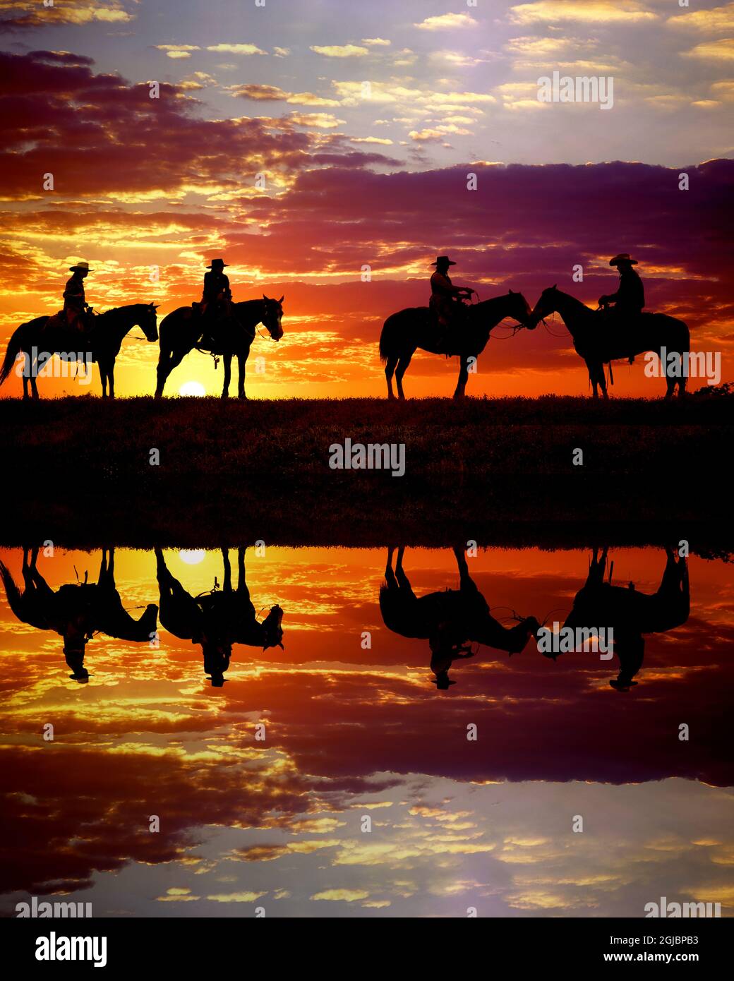 Cowboys on horses hi-res stock photography and images - Alamy