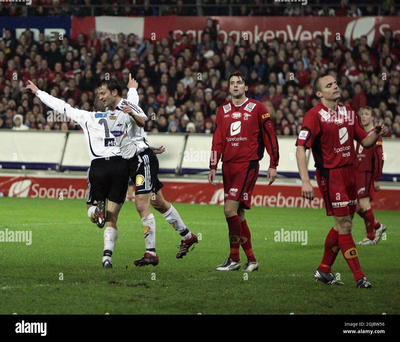 Rosenborg's Steffen Iversen (hidden) and Roar Strand celebrate a goal ...