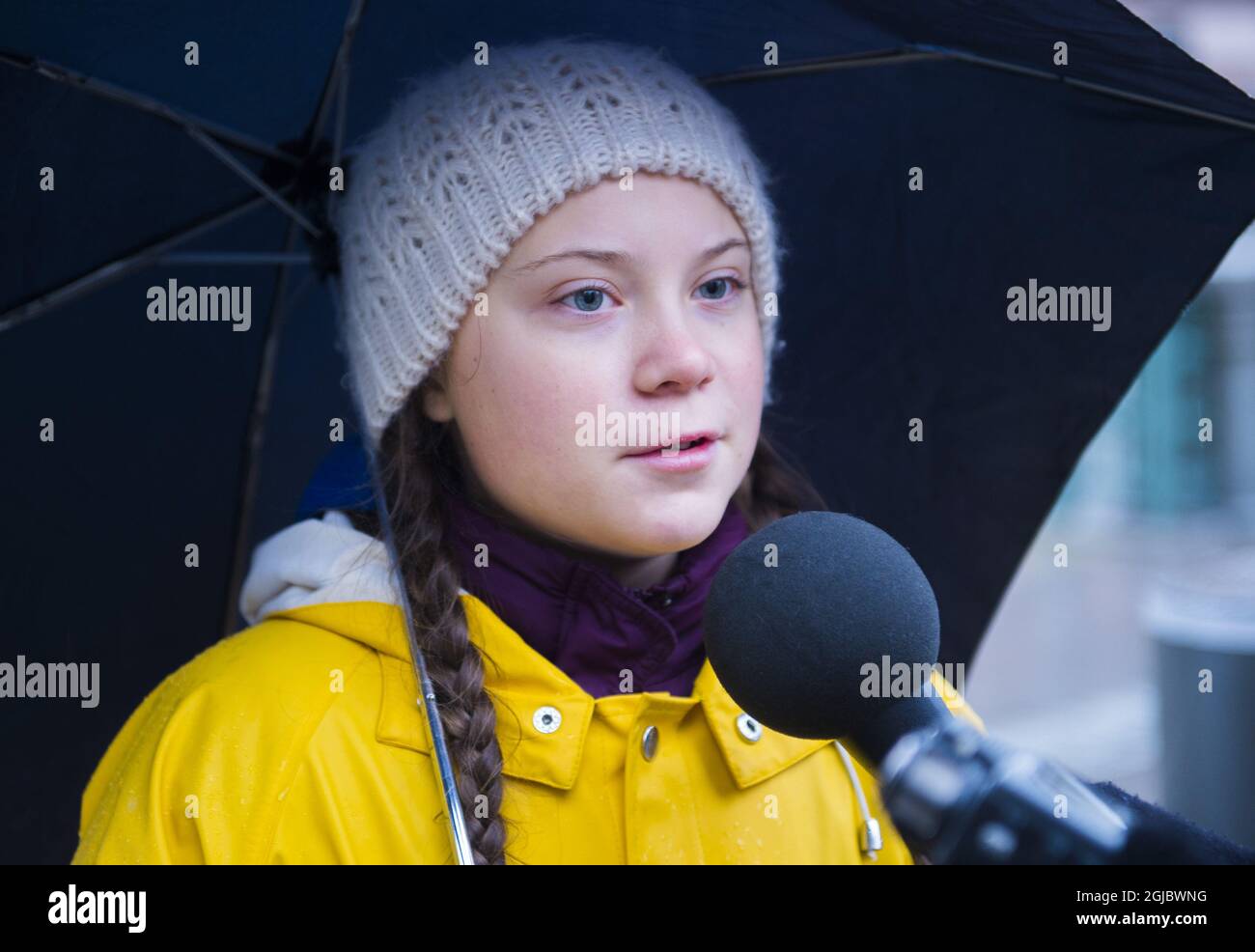 Swedish 15-year-old girl Greta Thunberg holds a placard reading "School ...