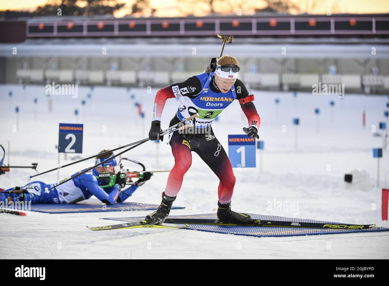 Johannes Thingnes Boe of Norway competes on the shooting range during ...
