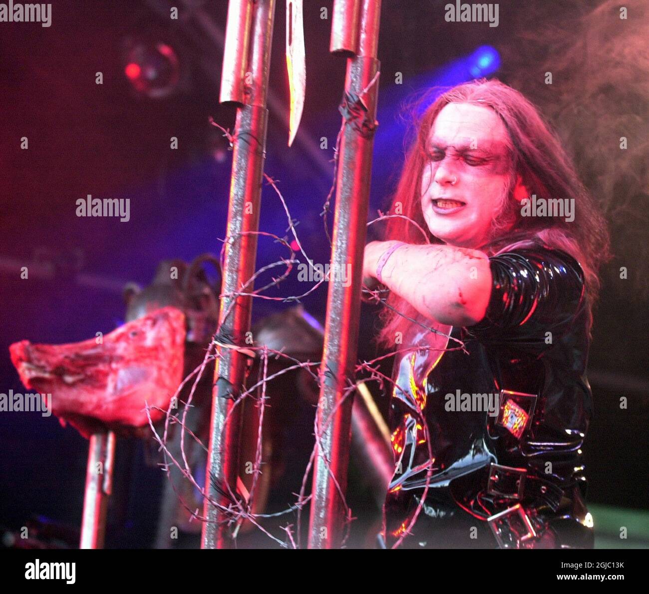 Editor's Note: Content Mayhem singer Maniac with a pig head during the ...