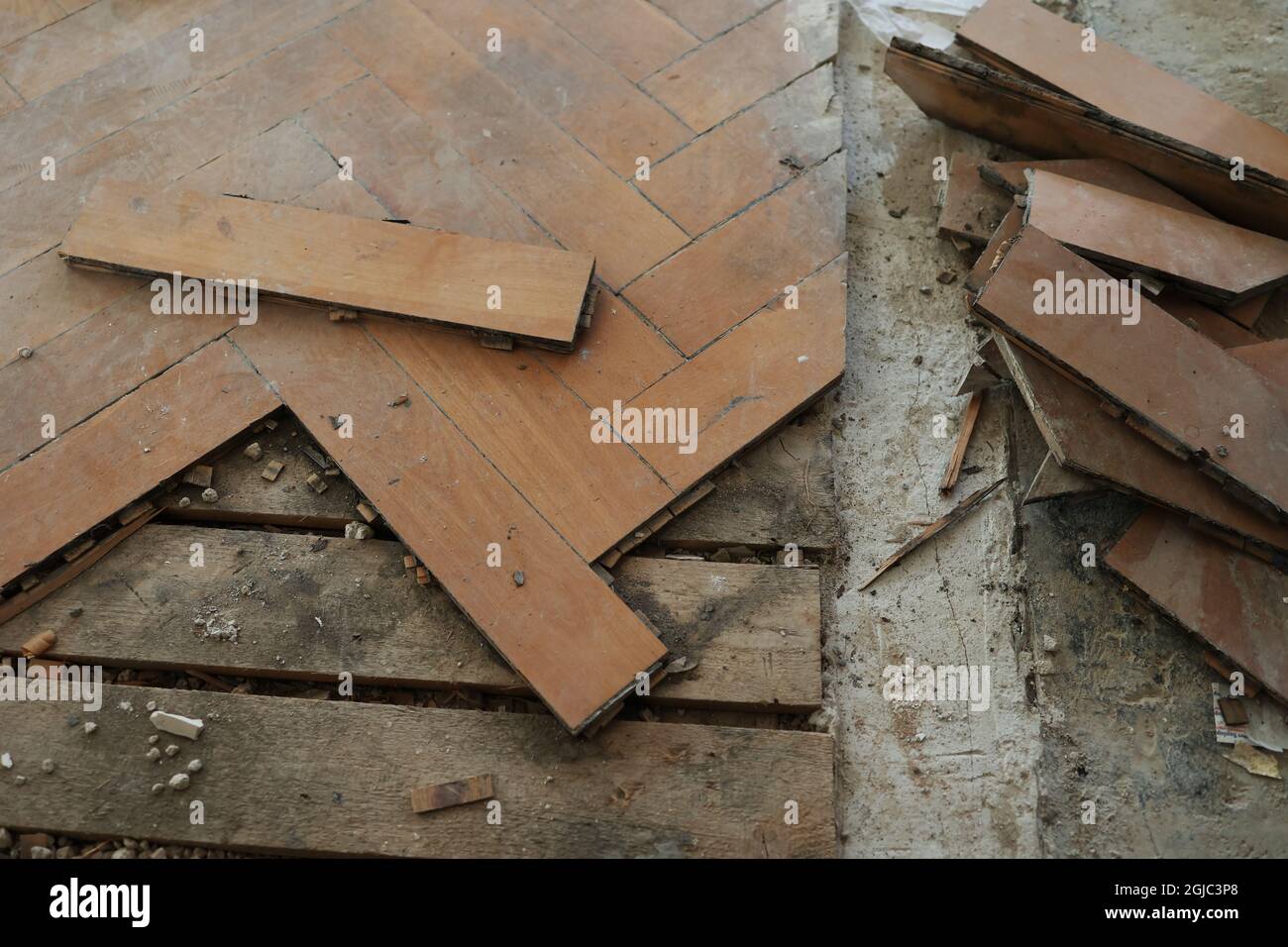 Closeup of an old broken dismantled parquet floor Stock Photo - Alamy