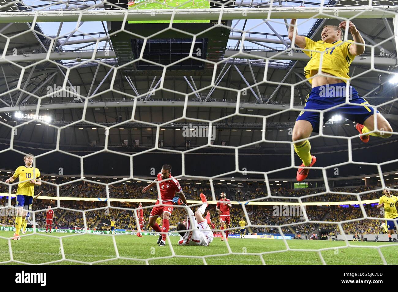 Sweden's Viktor Claesson (R) celebrates scoring past Malta's goalkeeper ...
