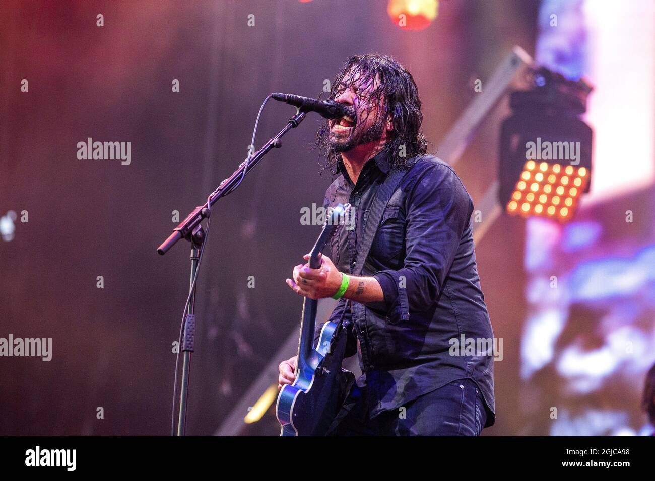 Dave Grohl and Foo Fighters performing on stage during the second day ...