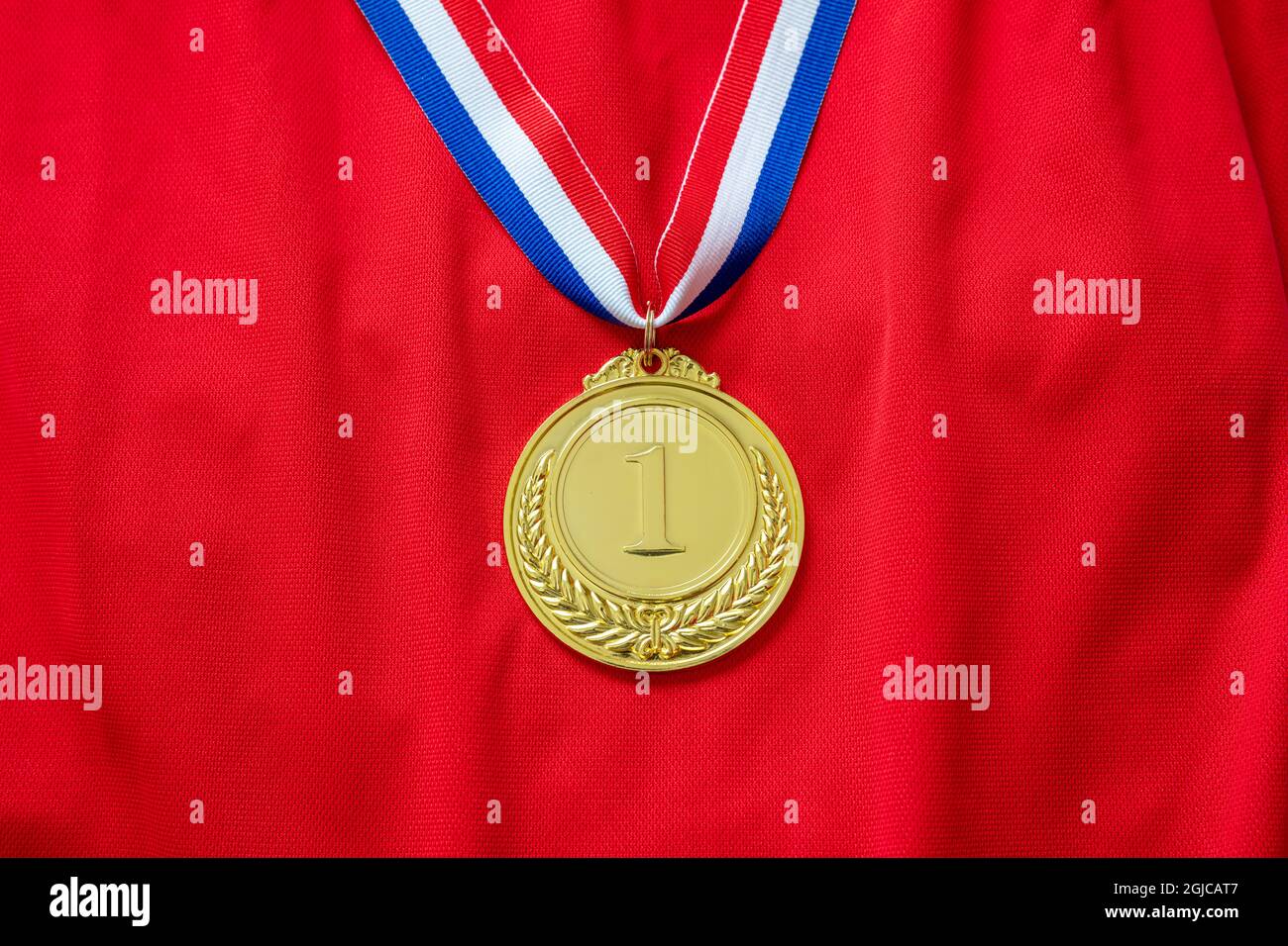 Medal gold, Winner prize award hanging with red blue color ribbon on ...