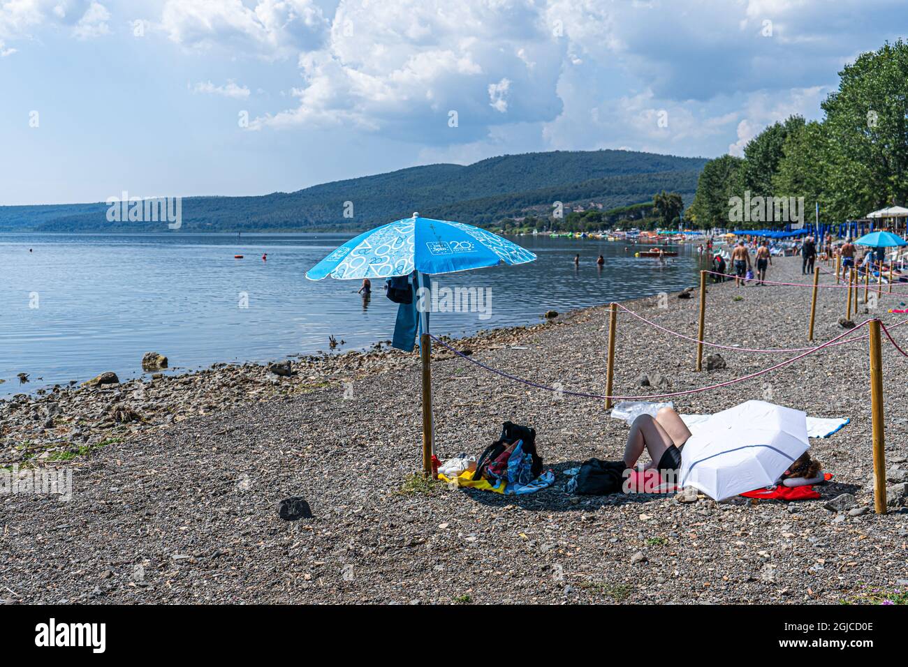 Italian woman sunbathing on beach hi-res stock photography and images ...