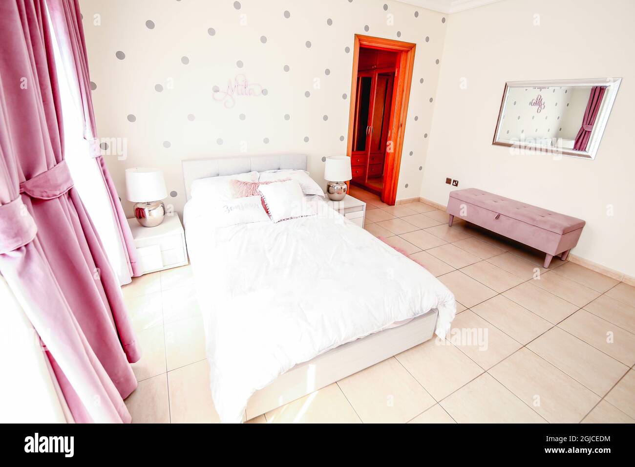 DOHA, QATAR - Oct 07, 2018: The bedroom interior in a cozy style with a ...