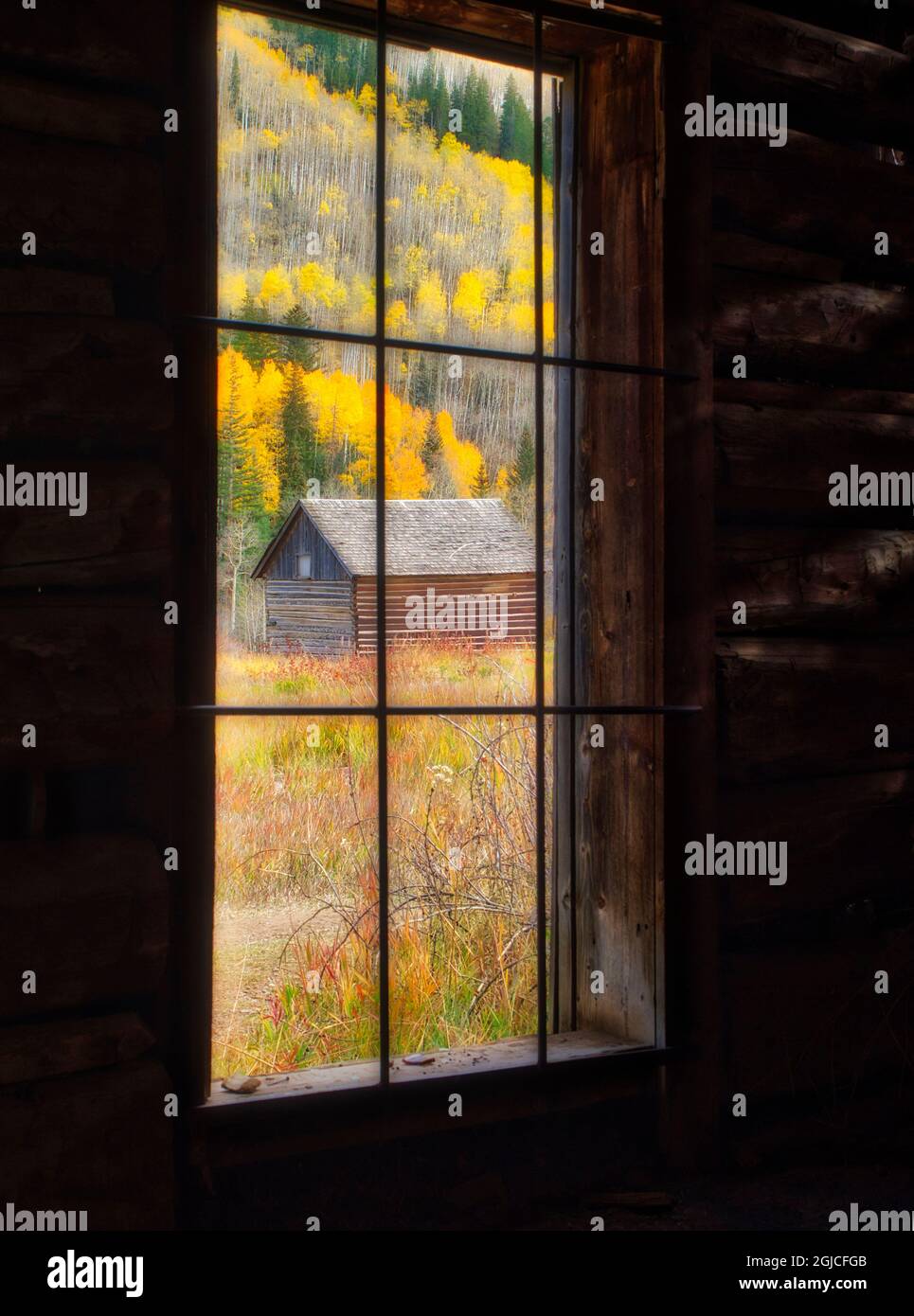 USA, Colorado. Looking out a window in the ghost town of Ashcroft in ...