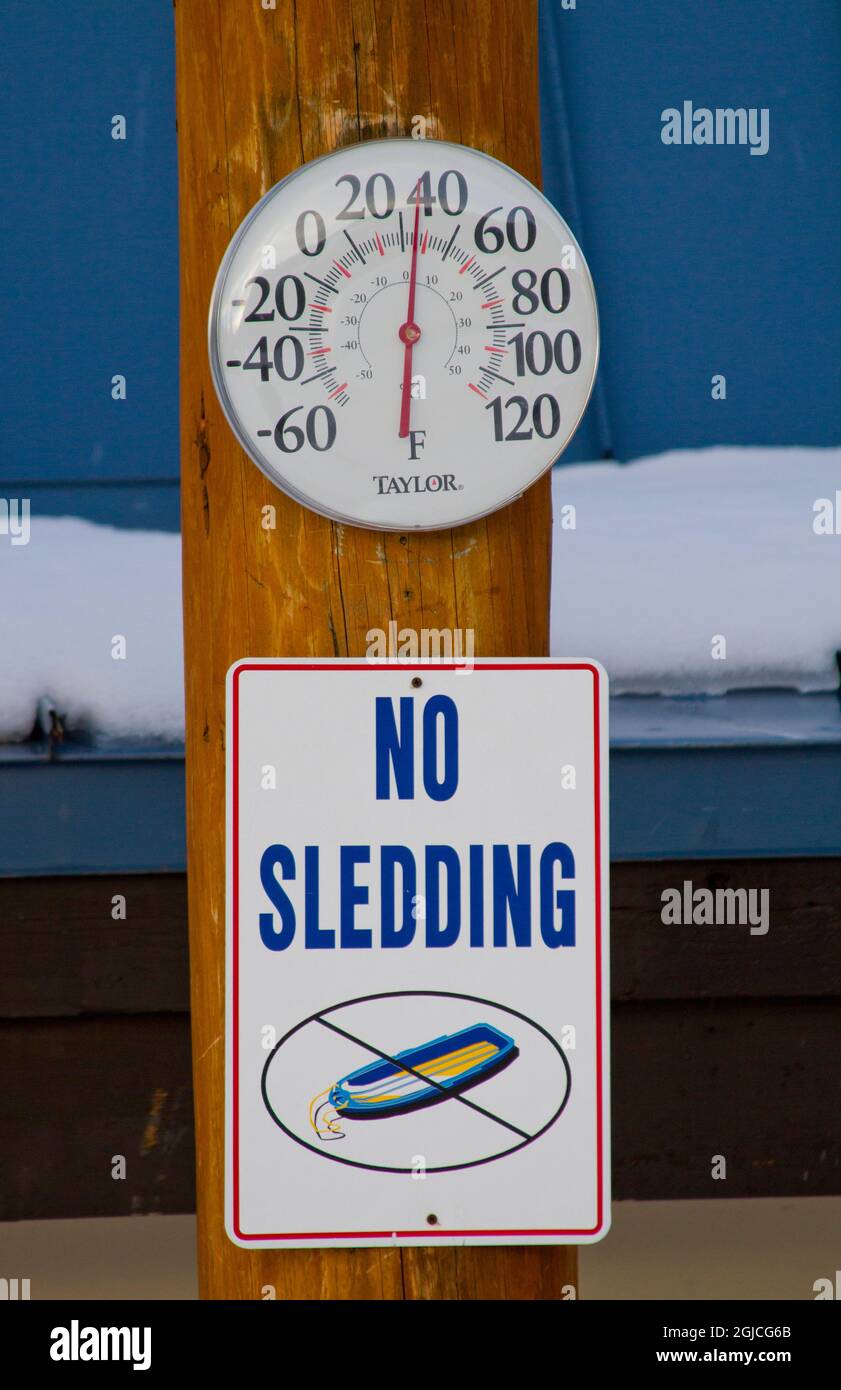 No sledding sign' and thermometer, Vail, Colorado Stock Photo - Alamy