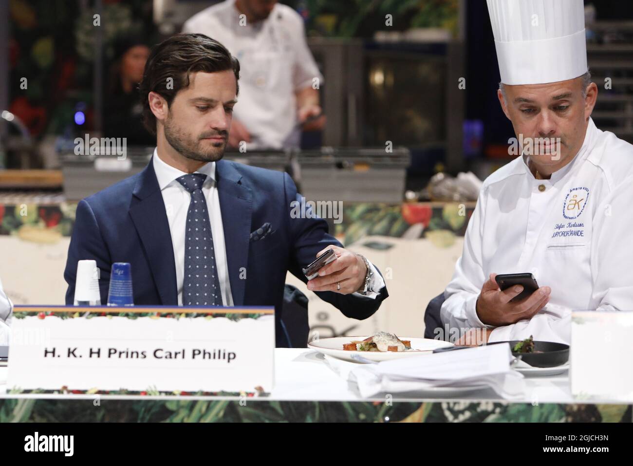 Prince Carl Philip takes some photos with his mobile - note the cover ...