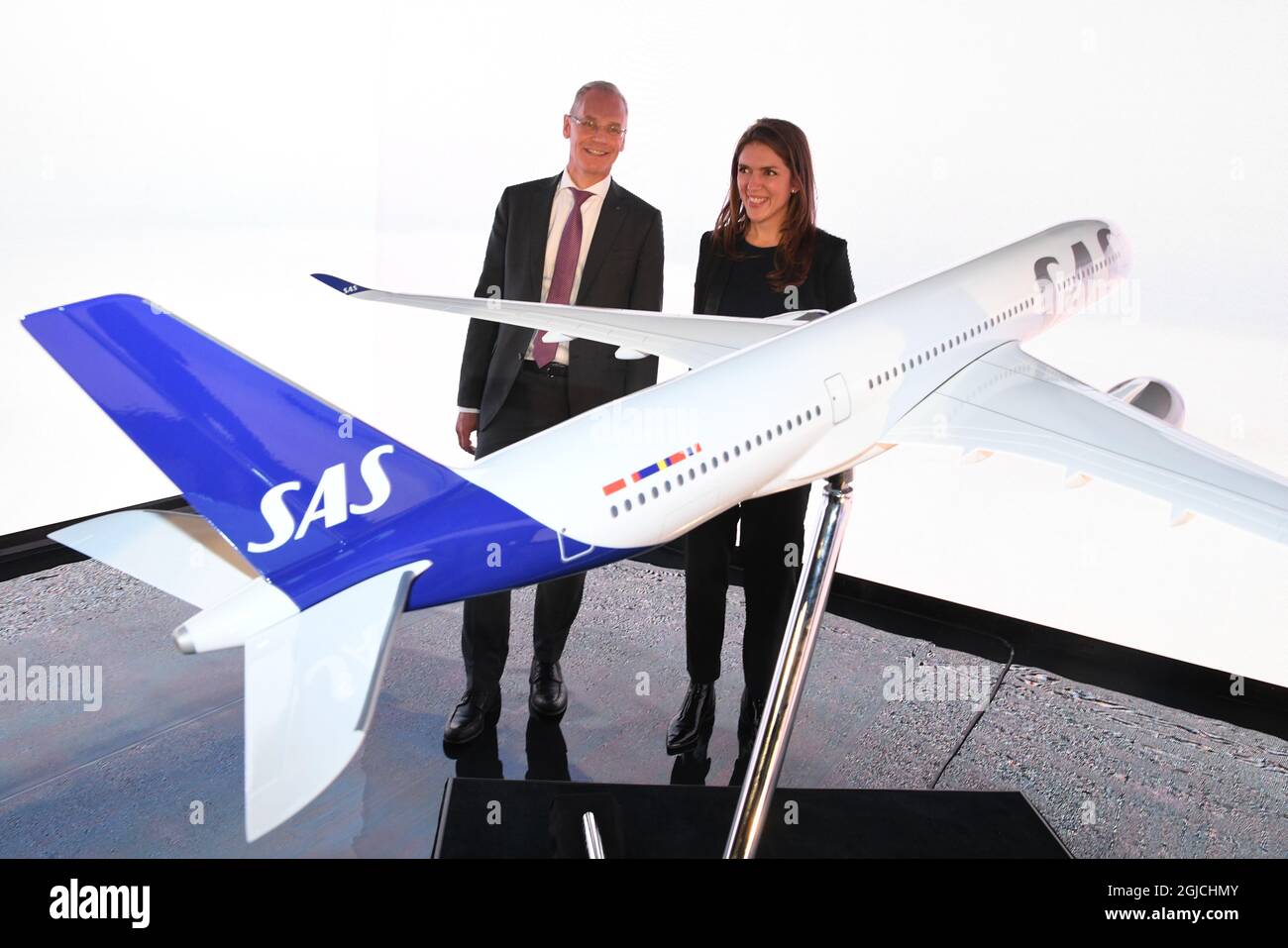 SAS CEO Rickard Gustafson AND head of Design Kristina Mayer poses by a ...