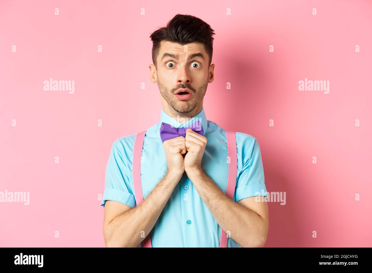 Startled and worried classy man in moustache, gasping and holding ...