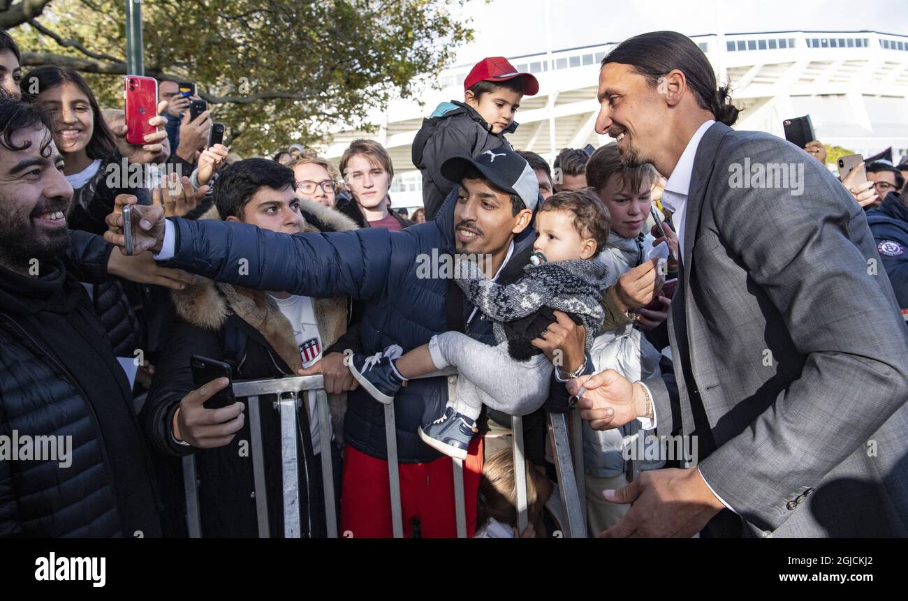 Swedish soccer star Zlatan Ibrahimovic (R) meet fans during the ...