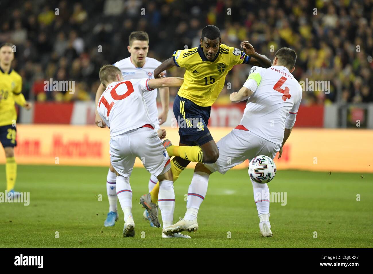 Sweden's Alexander Isak between Faroe Islands' Sølvi Vatnhamar and Atli ...