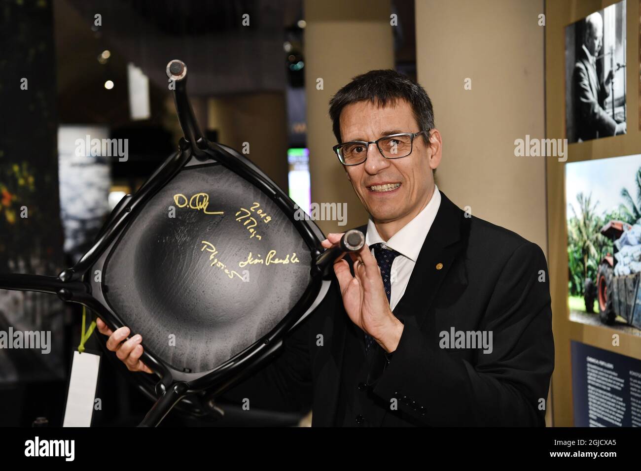 STOCKHOLM 20191206 Nobel Laureate in Physics Didier Queloz signs a ...