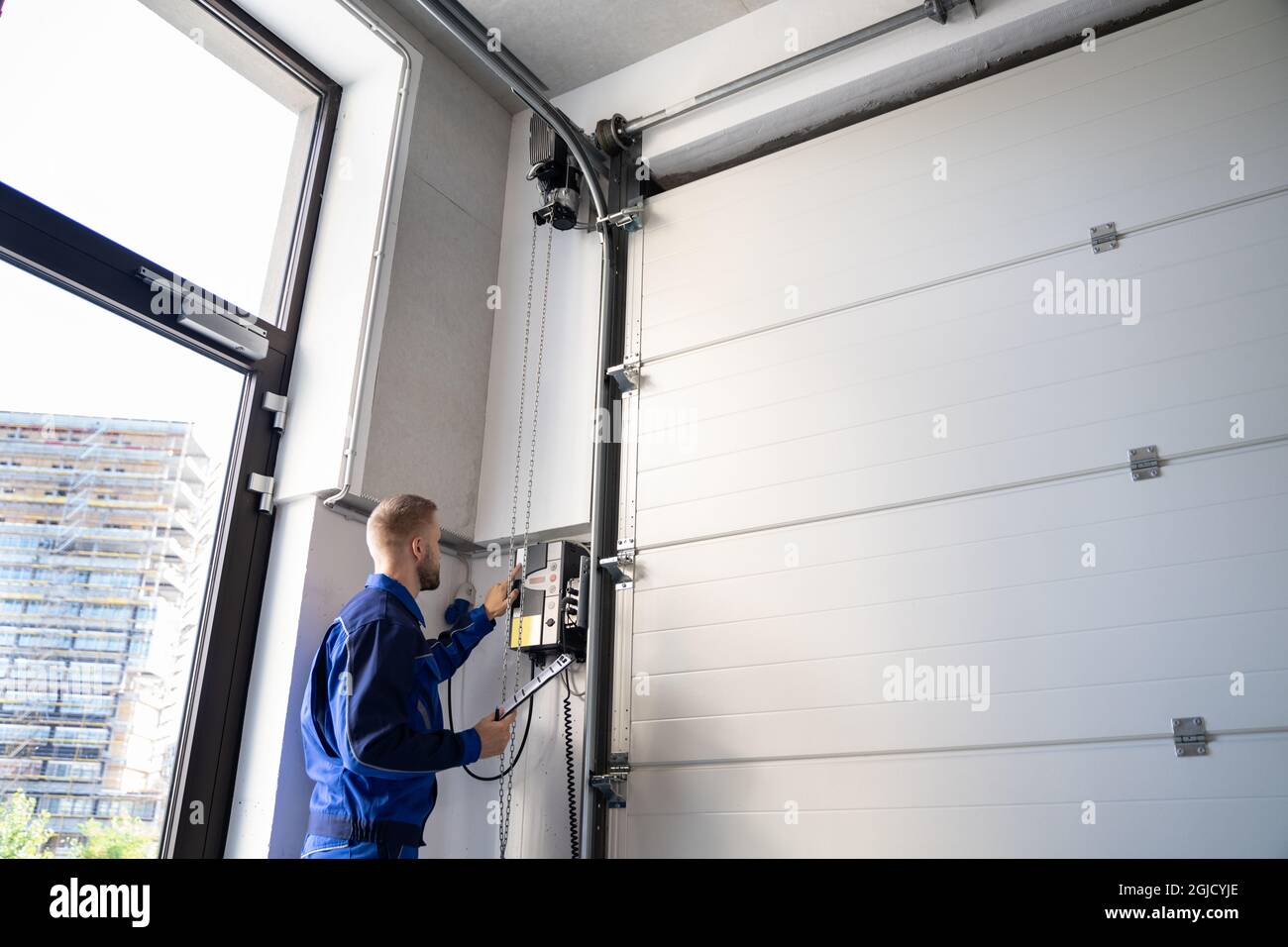 Door installation hi-res stock photography and images - Alamy