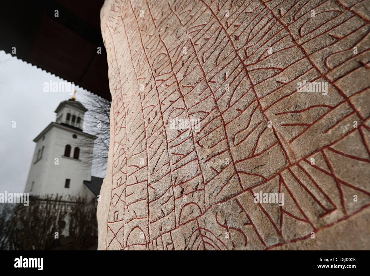 A detail of the Viking-era Rok runestone is seen in front of the Rok ...