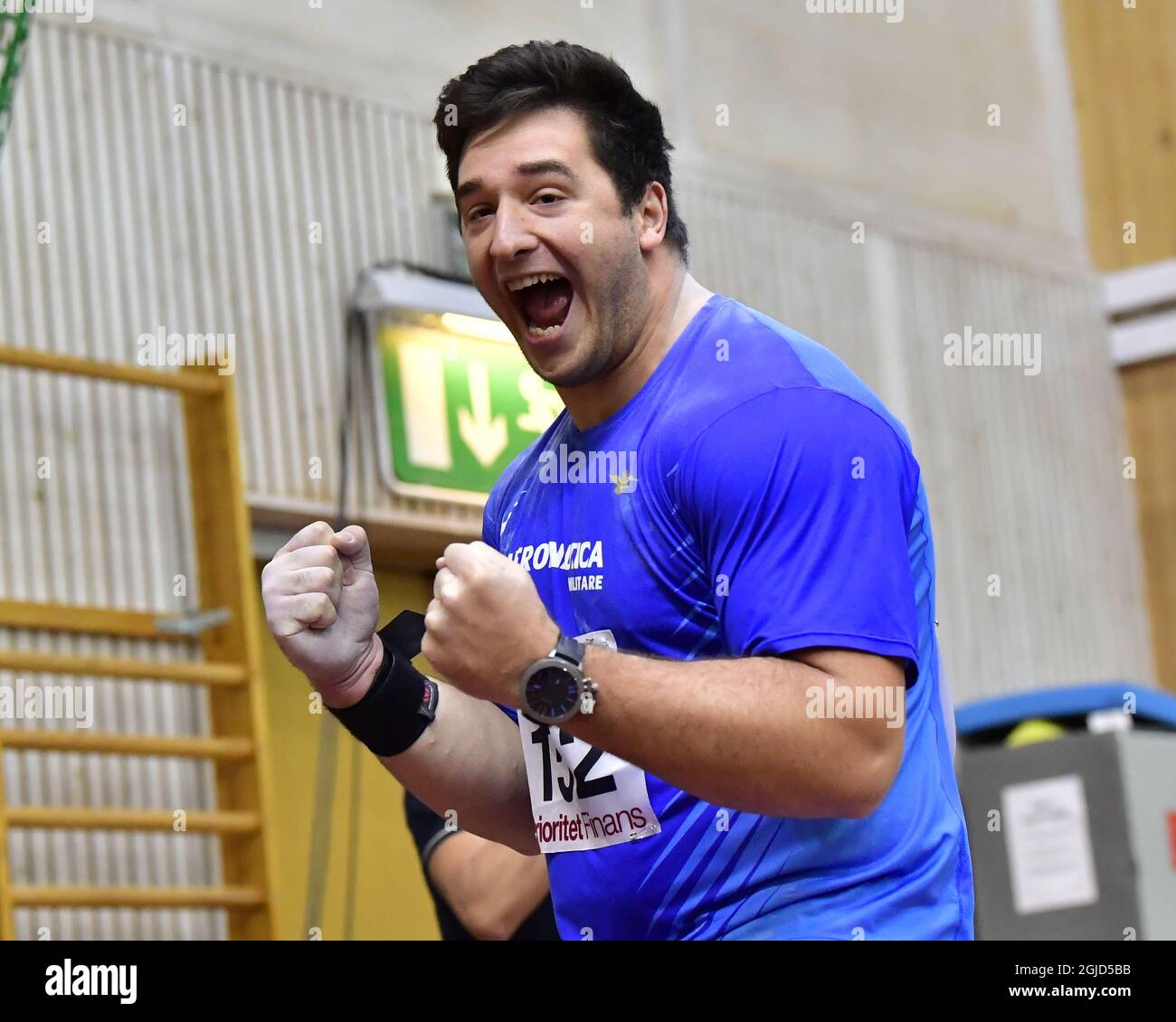Leonardo Fabbri of Italy reacts after his 21.59 m through at the shot ...