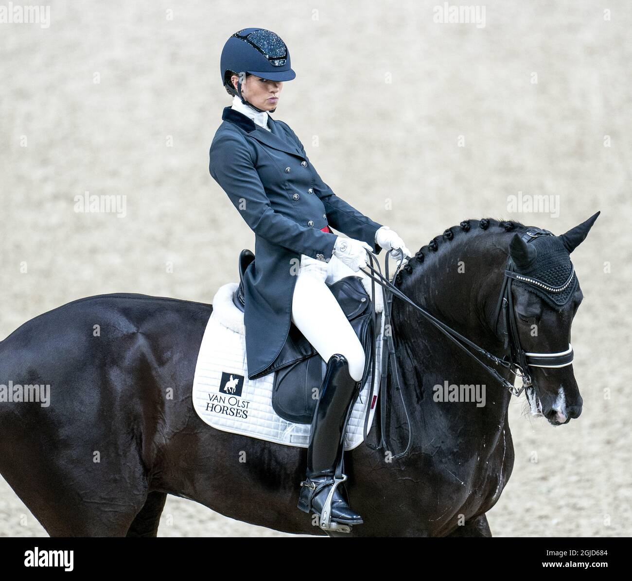 Charlotte Fry of Great Britain competing with the horse Dark Legend to ...