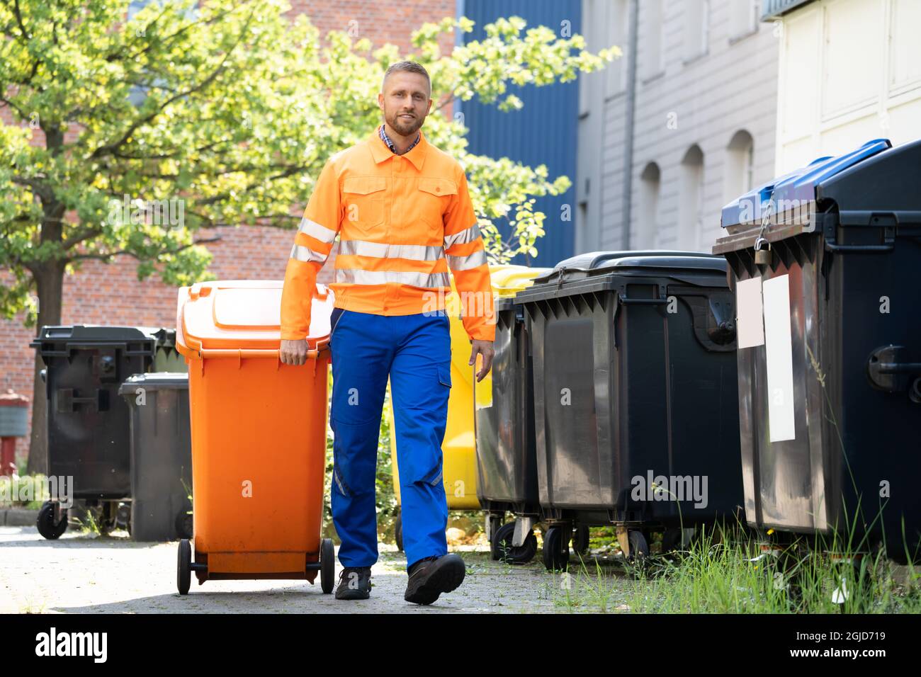 Happy garbage collectors hi-res stock photography and images - Alamy