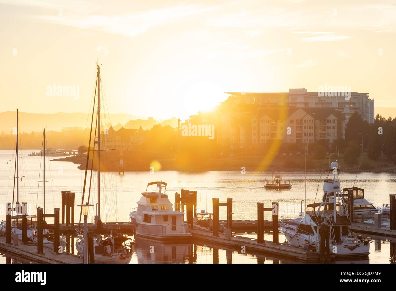 Boats parked at a marina in a modern city park Stock Photo - Alamy