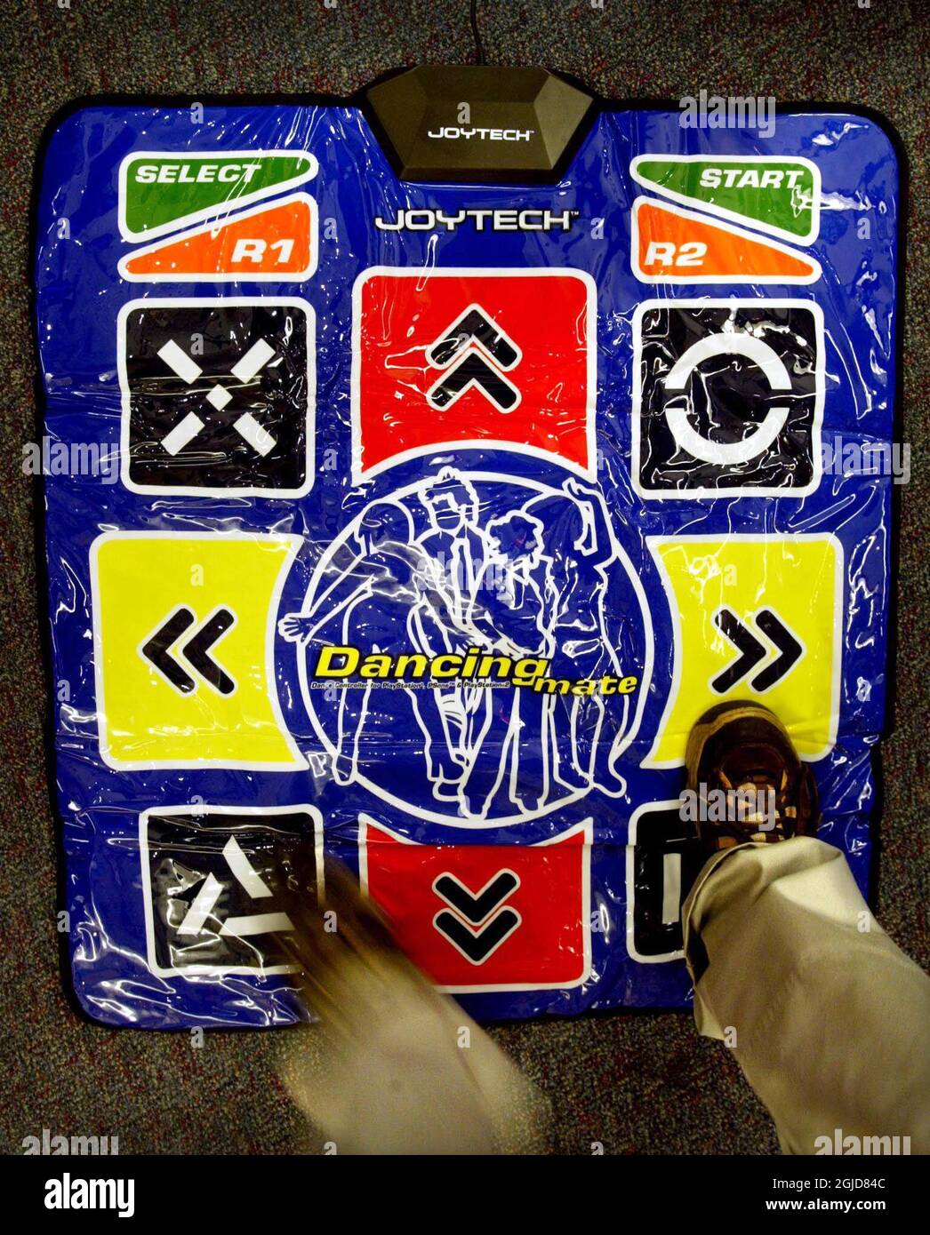 A Dance Dance Revolution carpet connected to a Playstation in Oslo ...