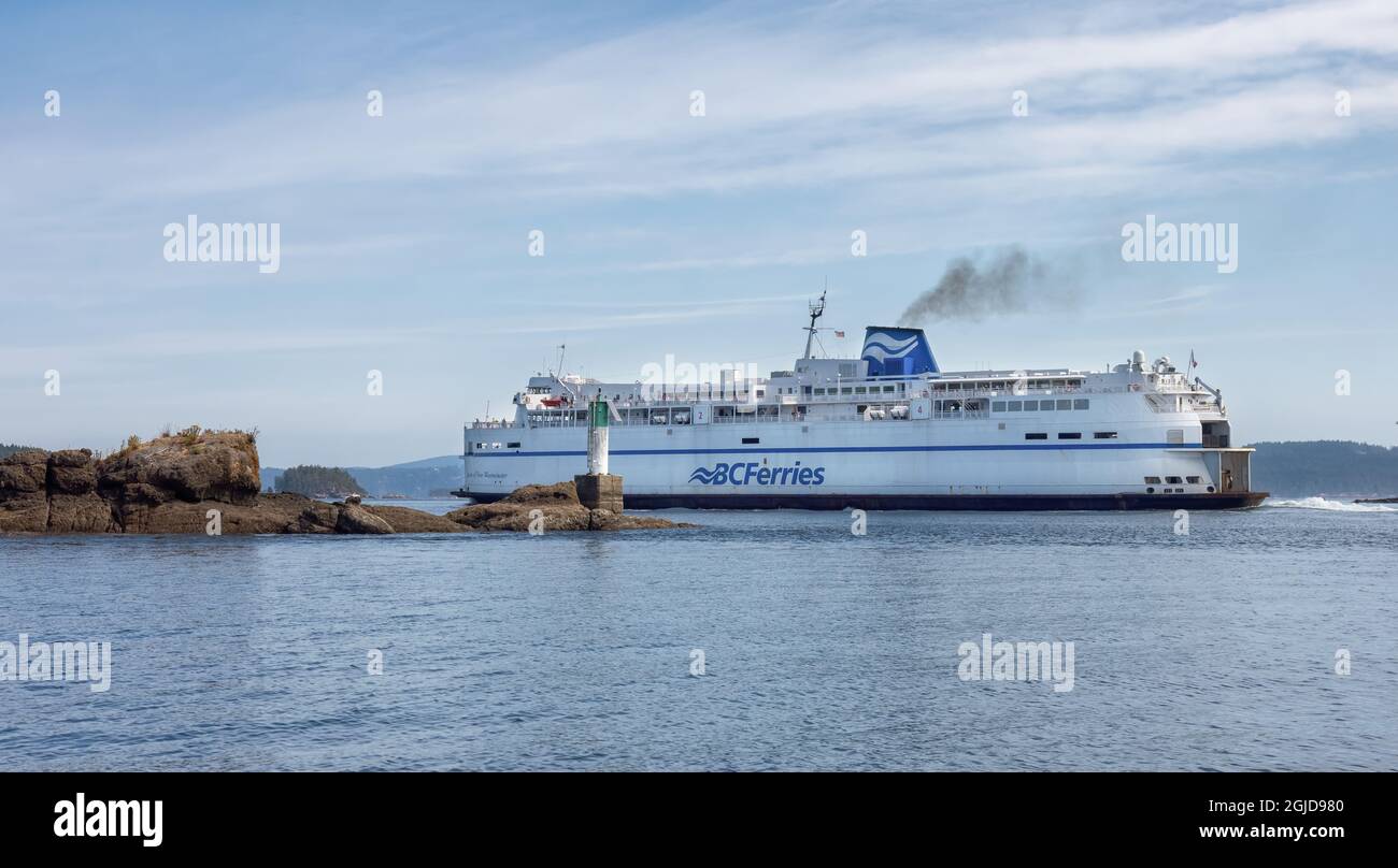 BC Ferries Boat Leaving the Terminal in Swartz Bay during sunny summer ...