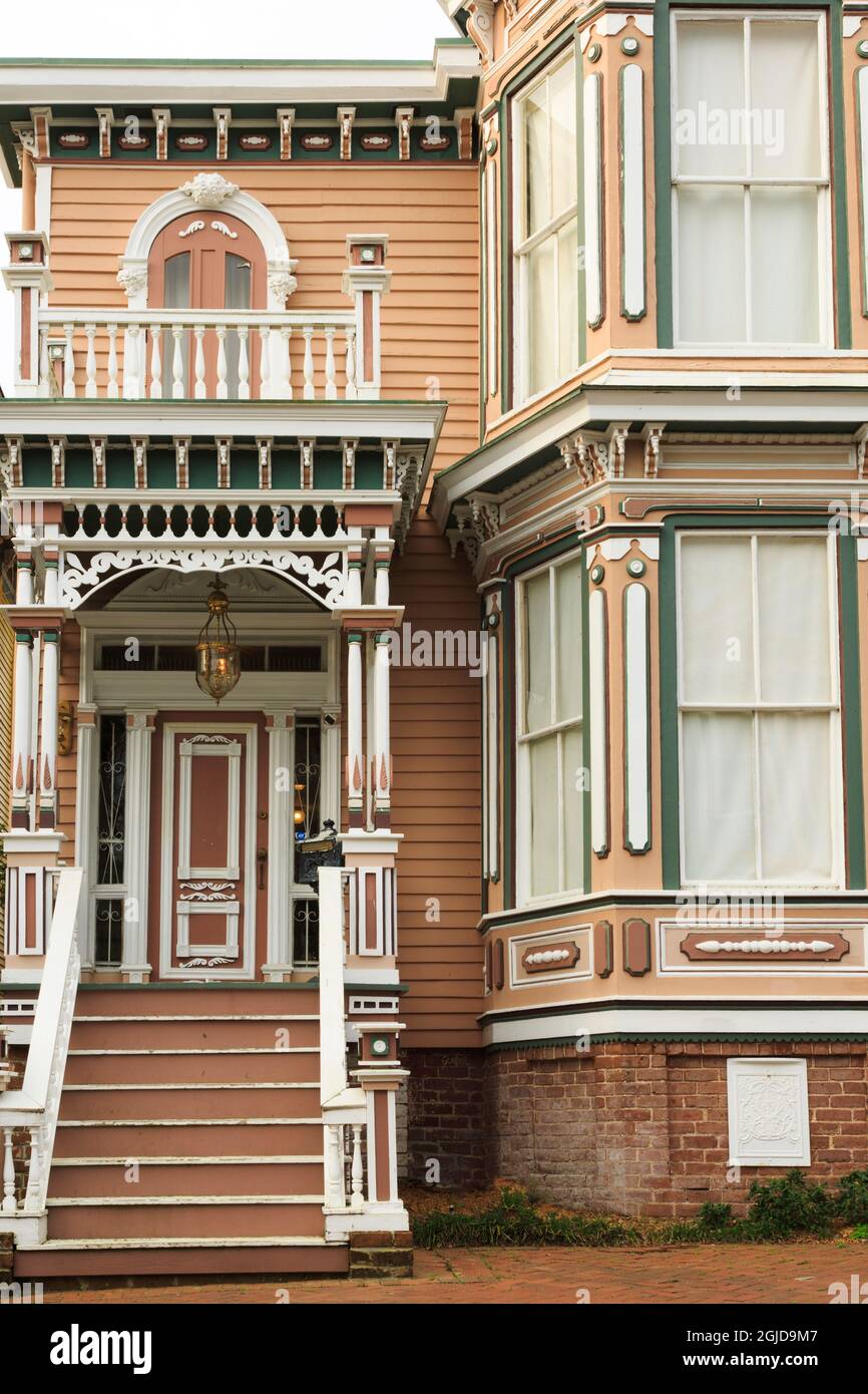 USA, Georgia, Savannah. Colorfully painted house in the Victorian ...