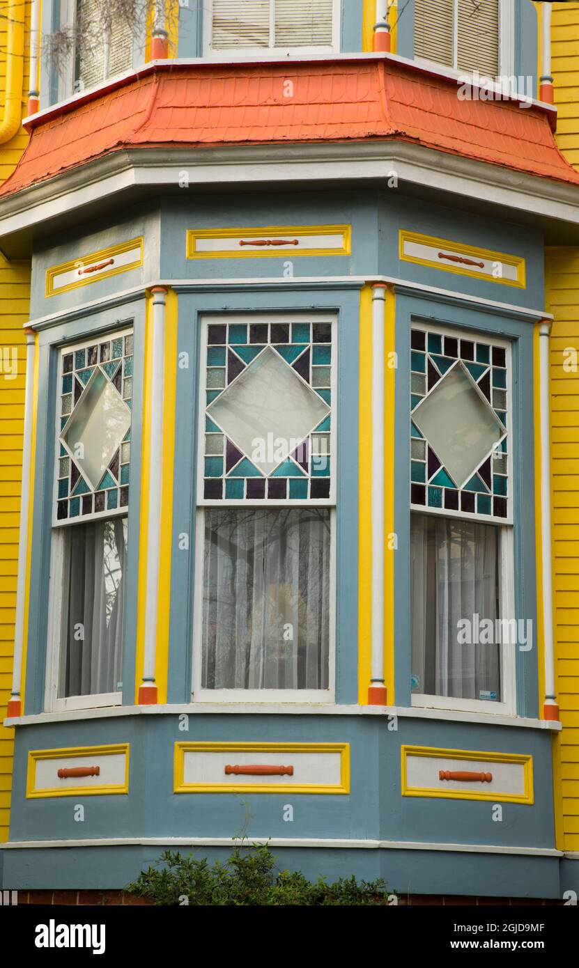 USA, Georgia, Savannah. Bay window of a colorfully painted house in the ...
