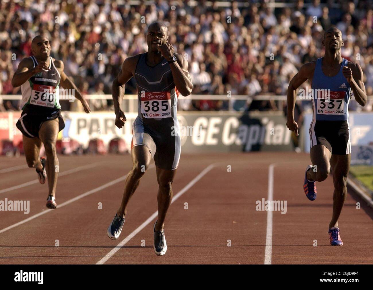 (C) USA's Alan Harrison sprints home to victory against (R) Sweden's ...