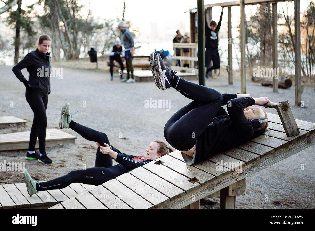 People train at an outdoor gym in the outskirts of Stockholm, Sweden ...