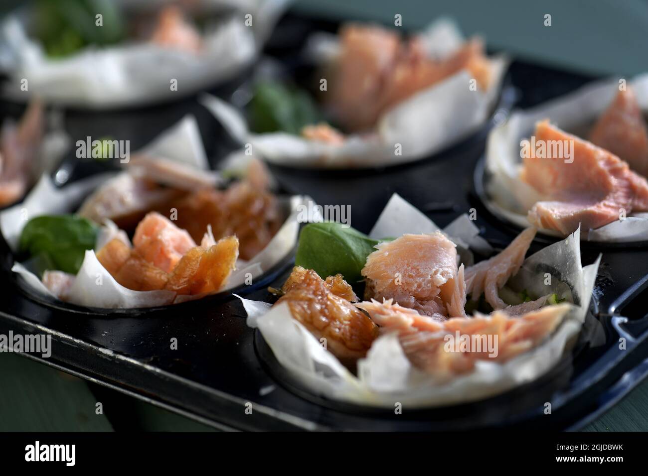 Making phyllo / filo pastries and pies. Mini pies filled with smoked ...