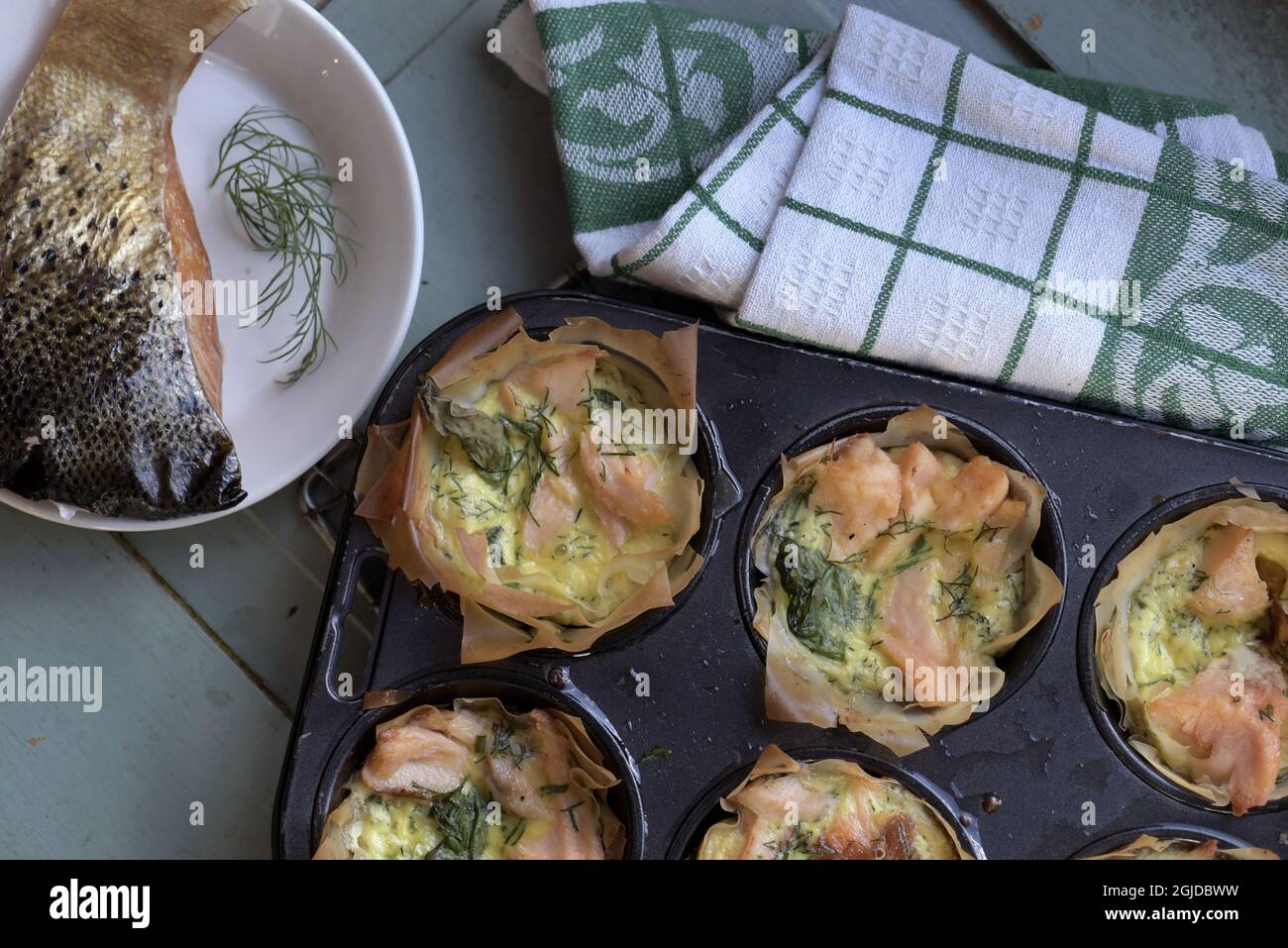 Making phyllo / filo pastries and pies. Mini pies filled with smoked ...