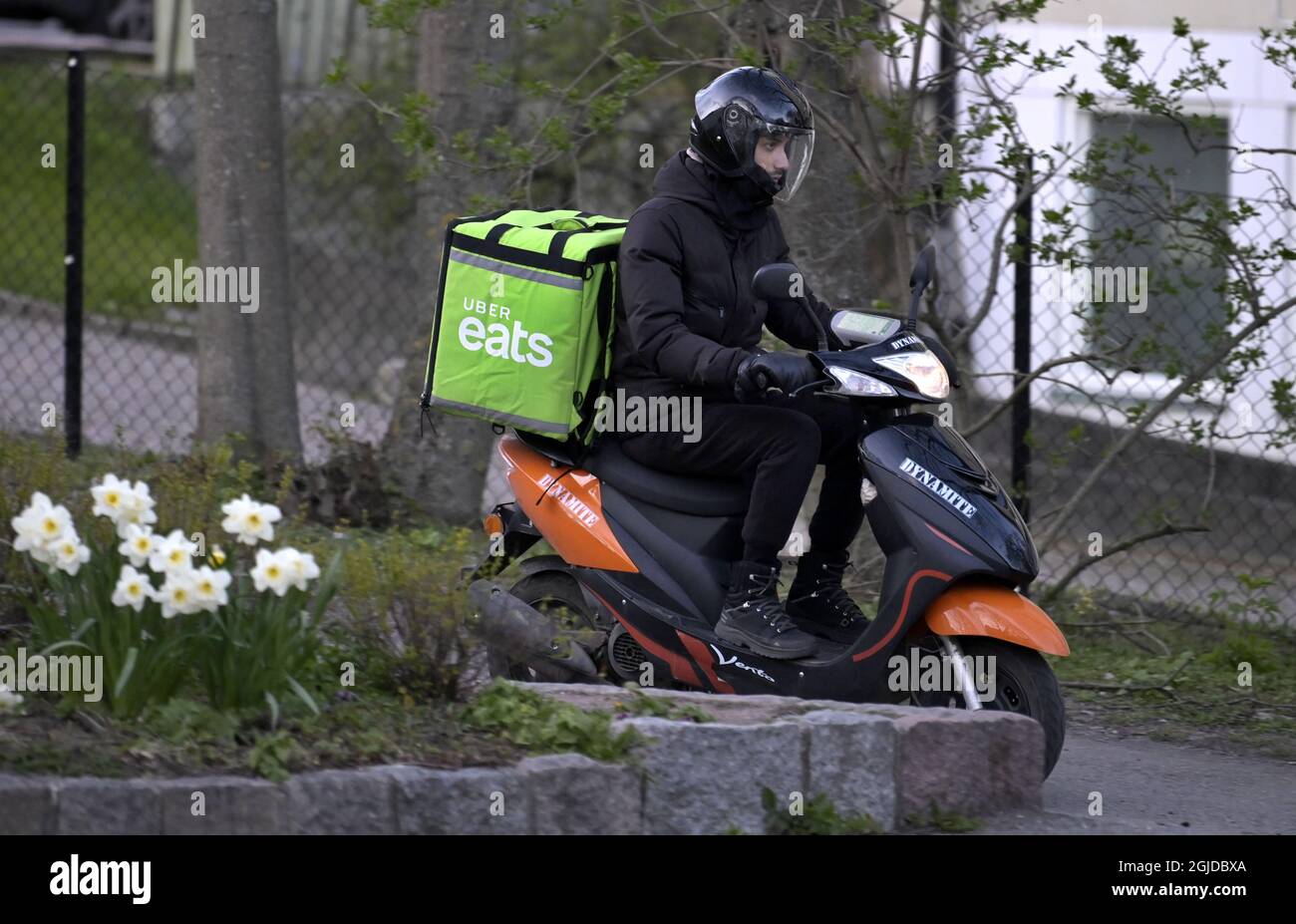 Food delivery with bike courier from Uber eats Photo Janerik Henriksson ...