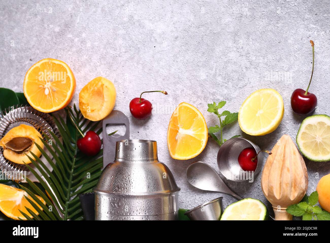 cocktail shaker tools set with berries and fruits Stock Photo - Alamy