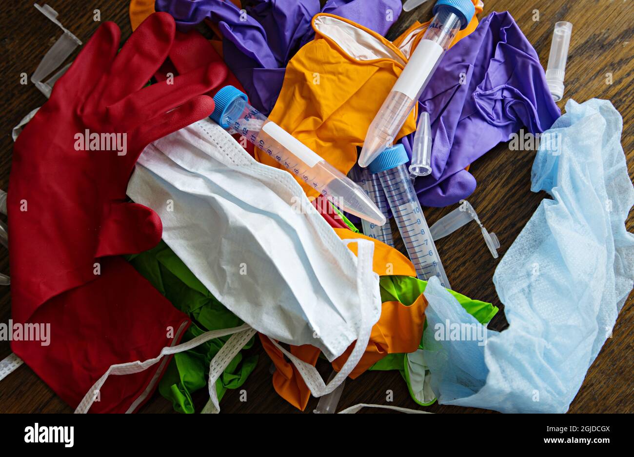 Plastic gloves, face masks and test tubes - Personal Protective ...
