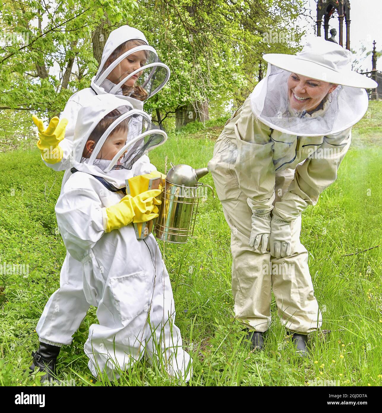 Crown Princess Victoria with princess Estelle and prince Oscar tending ...