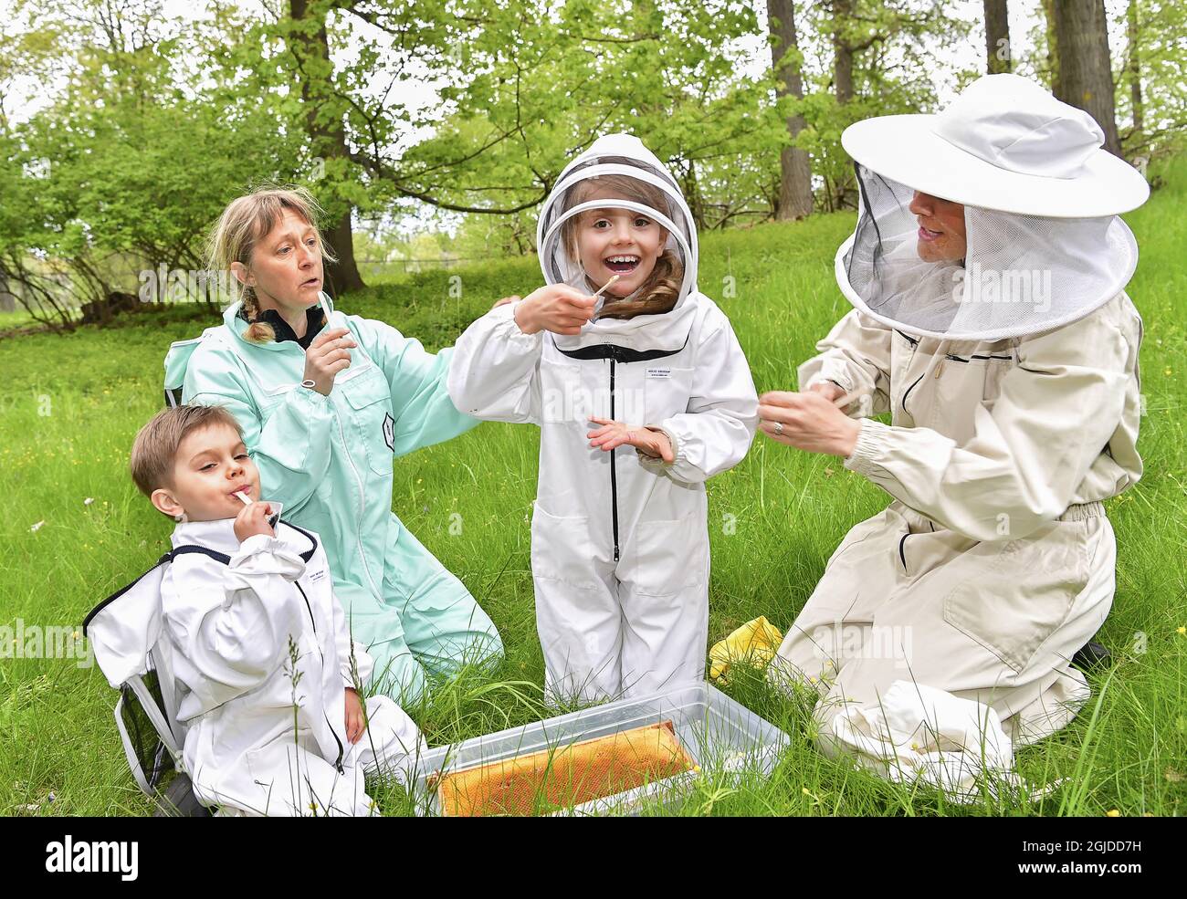 Crown Princess Victoria with princess Estelle and prince Oscar tending ...