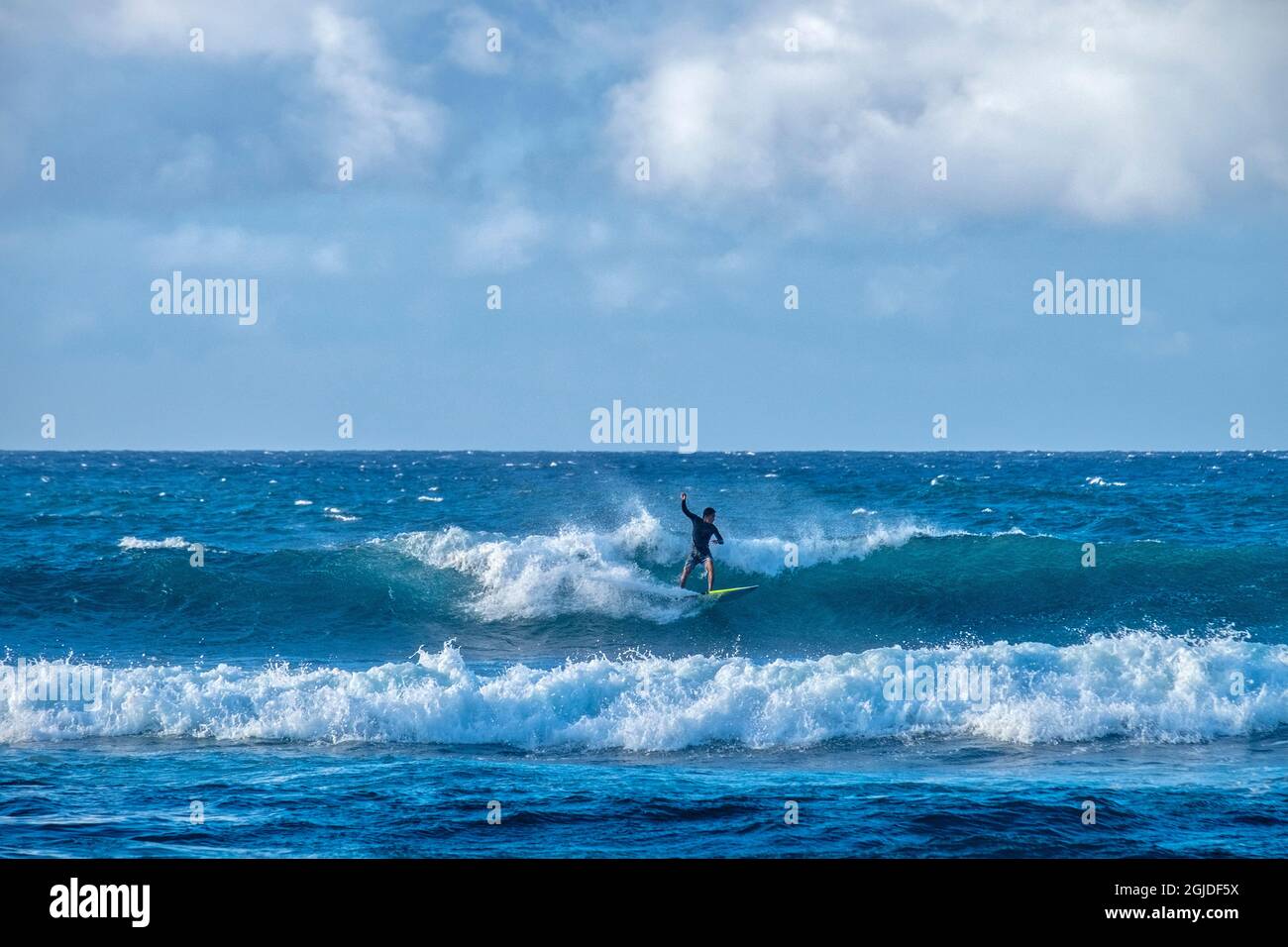 Surfing at Ho'okipa Beach Park, Maui, Hawaii, USA Stock Photo - Alamy