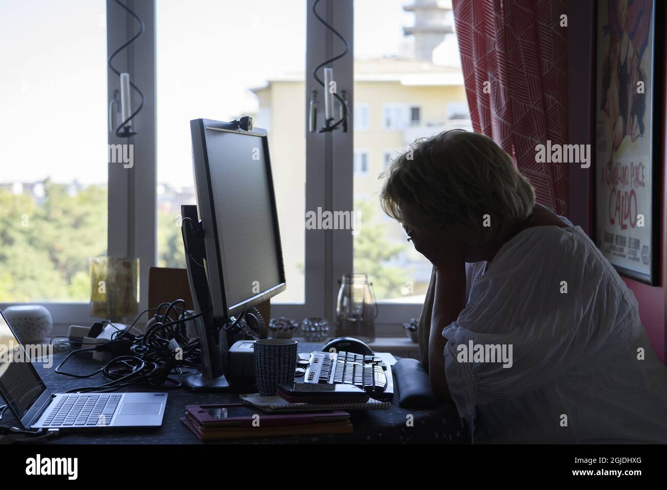 A woman fed up with working from home, working remotely, during the ...