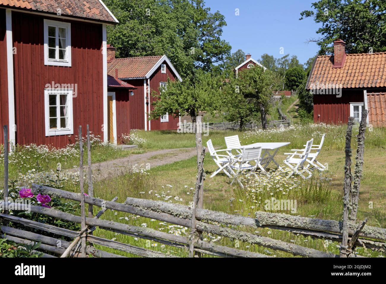 Red Houses In Stensjo Village Culture Reserve Smaland Photo Anders red-houses-in-stensjo-village-culture-reserve-smaland-photo-anders