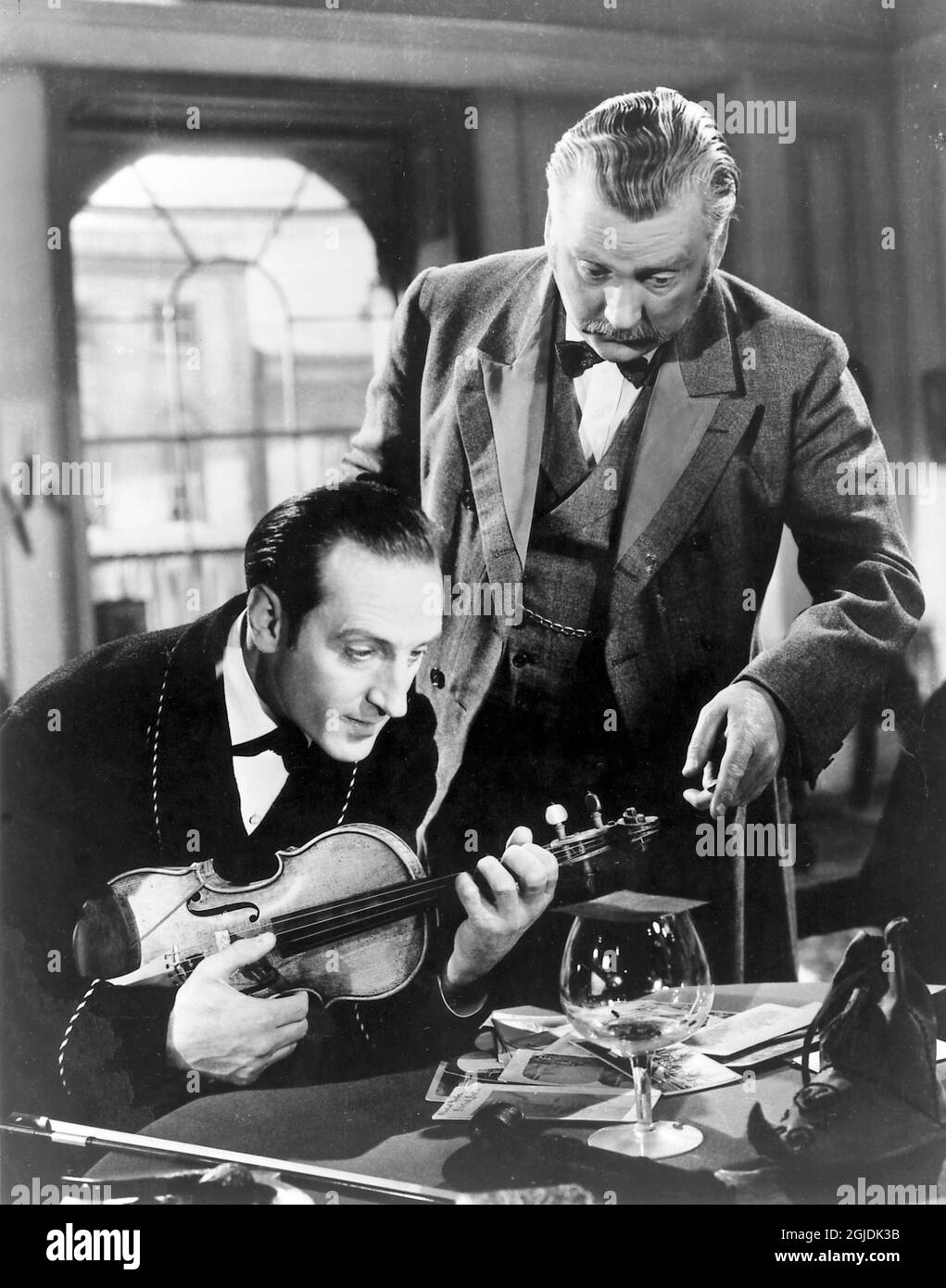 BASIL RATHBONE and NIGEL BRUCE in THE ADVENTURES OF SHERLOCK HOLMES ...