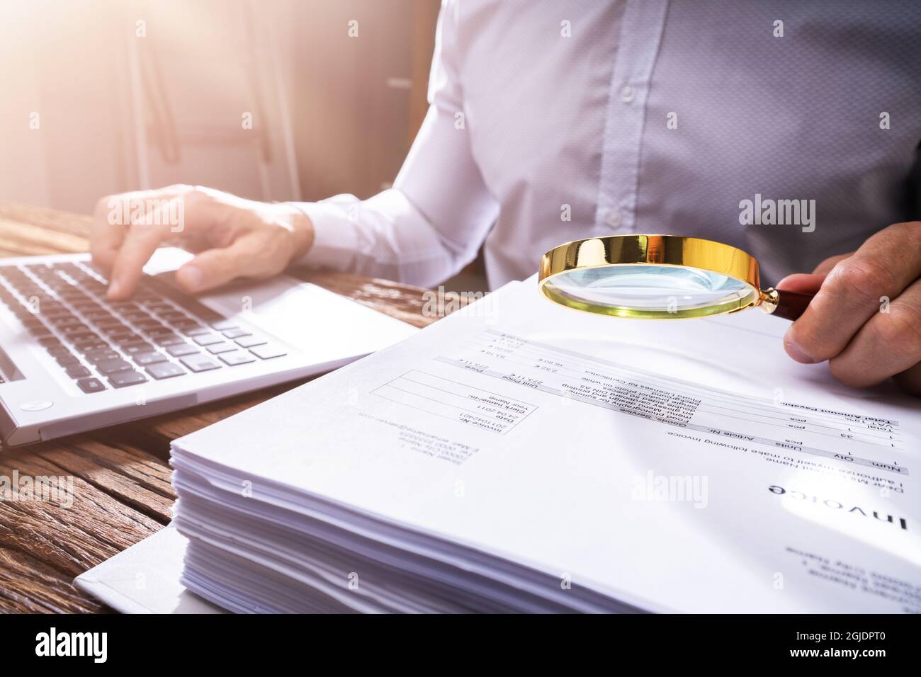 Investigating Corporate Tax Fraud. Commercial Auditor Using Magnifying ...