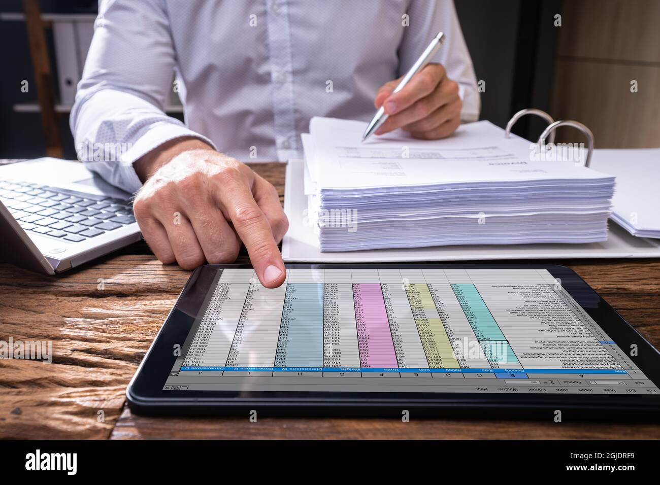 Electronic Spreadsheet On Analyst Computer Using Tablet Stock Photo - Alamy